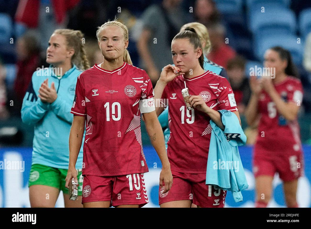 Denmark's Pernille Harder, left, and Janni Thomsen are dejected after ...
