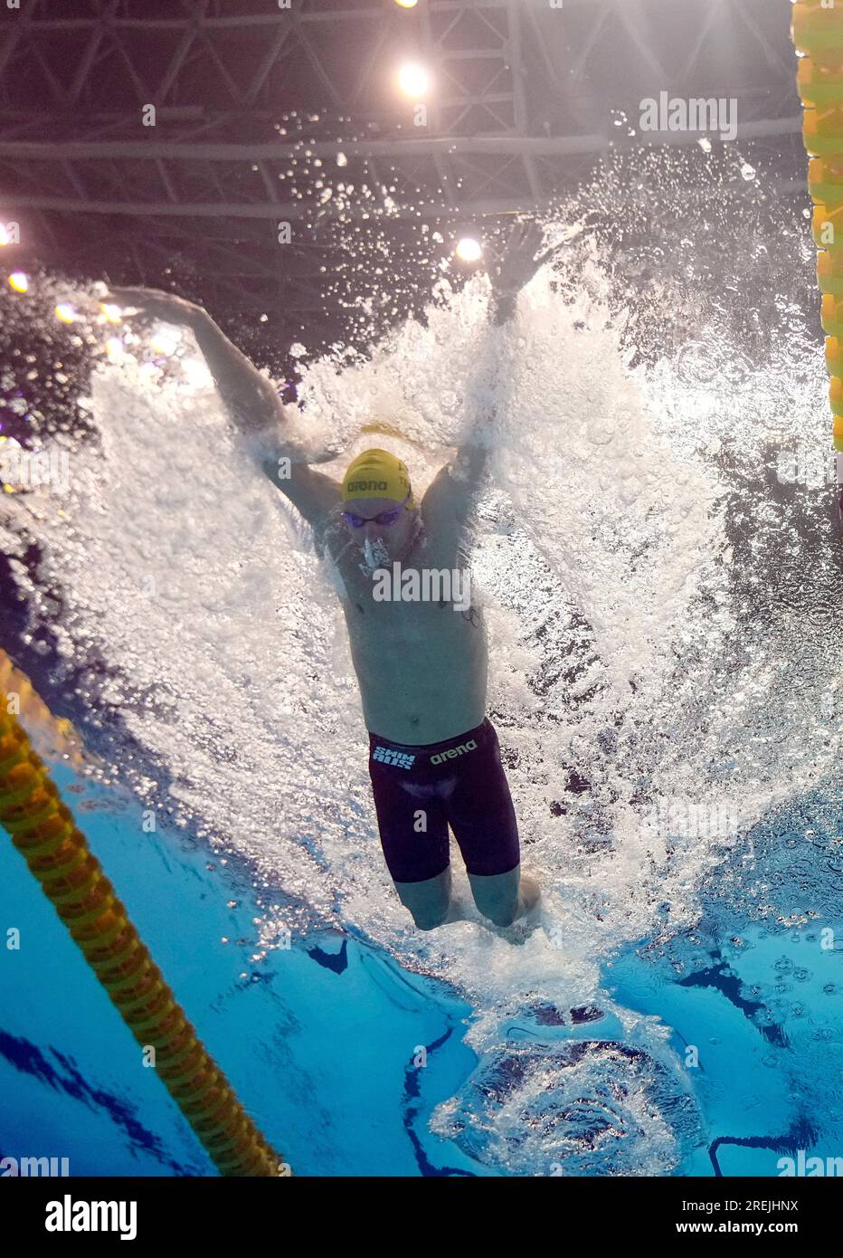 Matthew Temple, of Australia, competes in a men's 100-meter butterfly ...