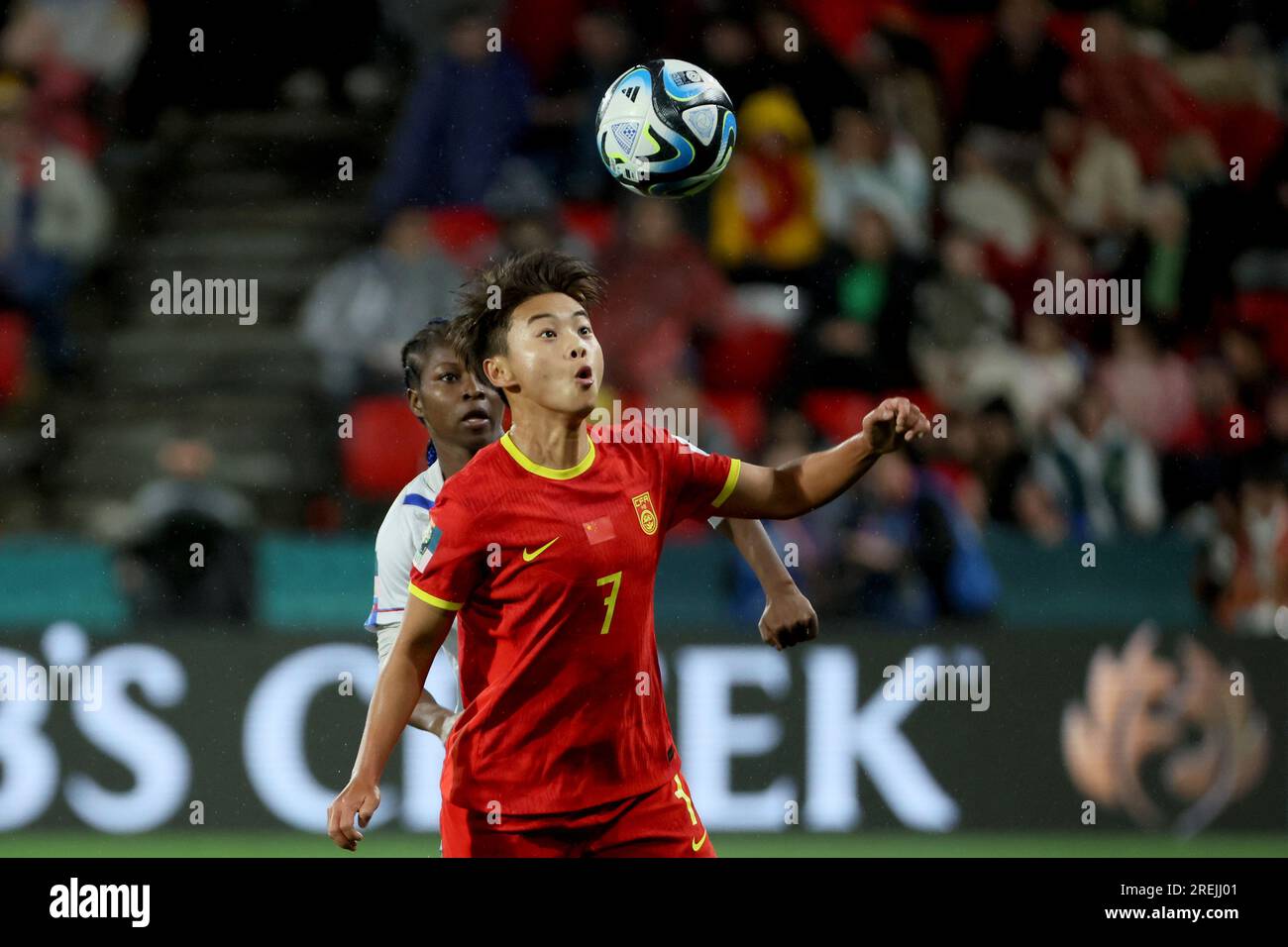 China's Wang Shuang controls the ball, in front of Haiti's Batcheba ...