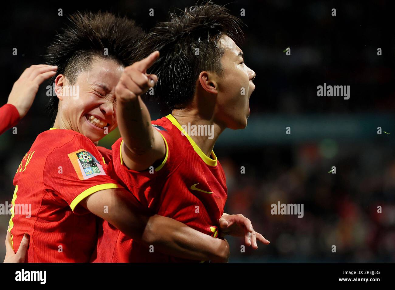 China's Wang Shuang, right, celebrates after scoring the opening goal ...