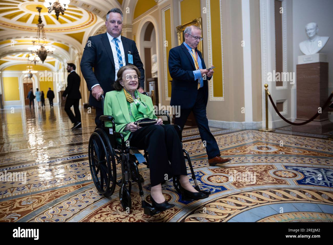 Sen. Dianne Feinstein (D-Calif.) is seen in a wheelchair as she departs ...