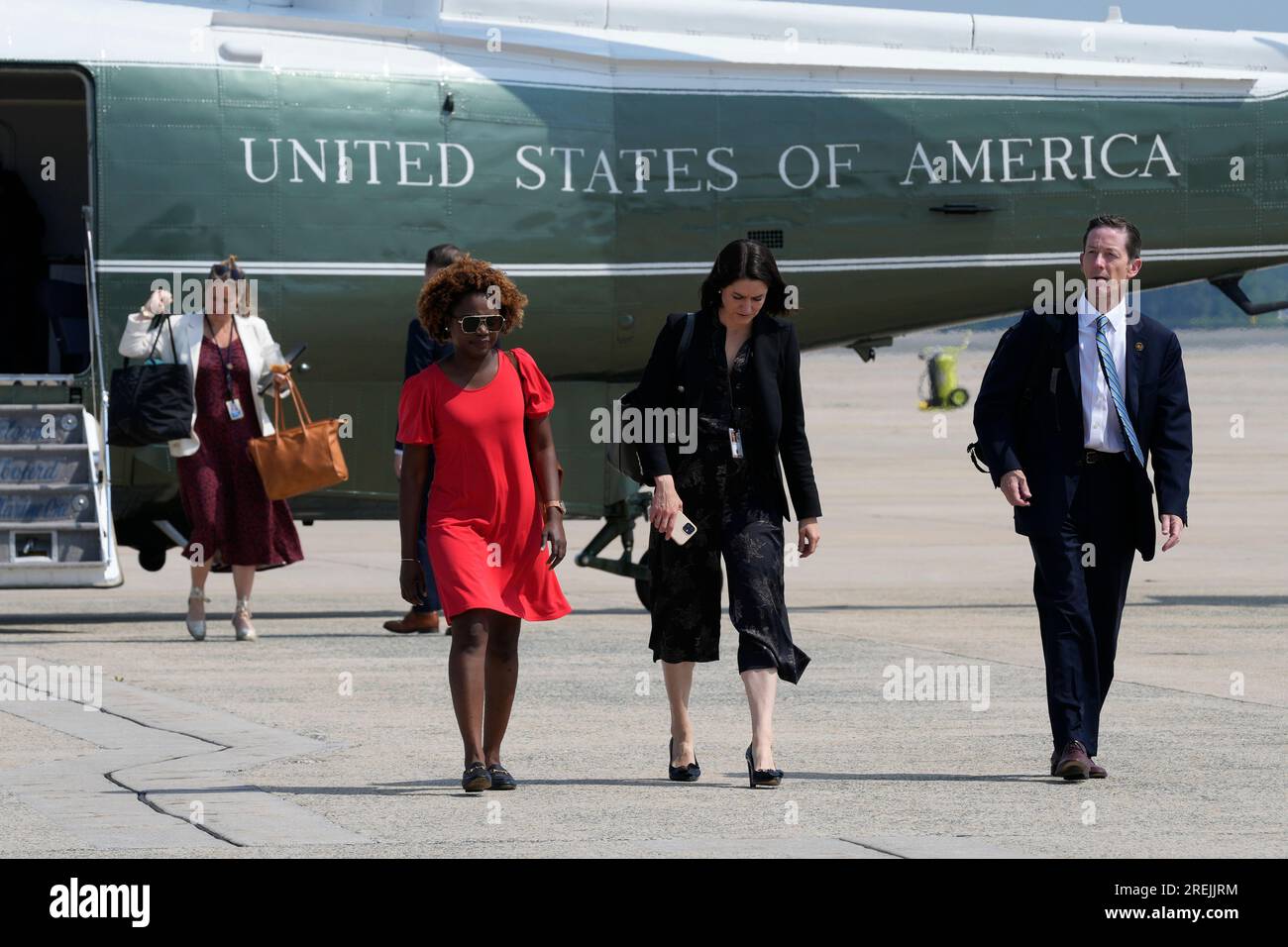 White House press secretary Karine Jean-Pierre, second from left ...