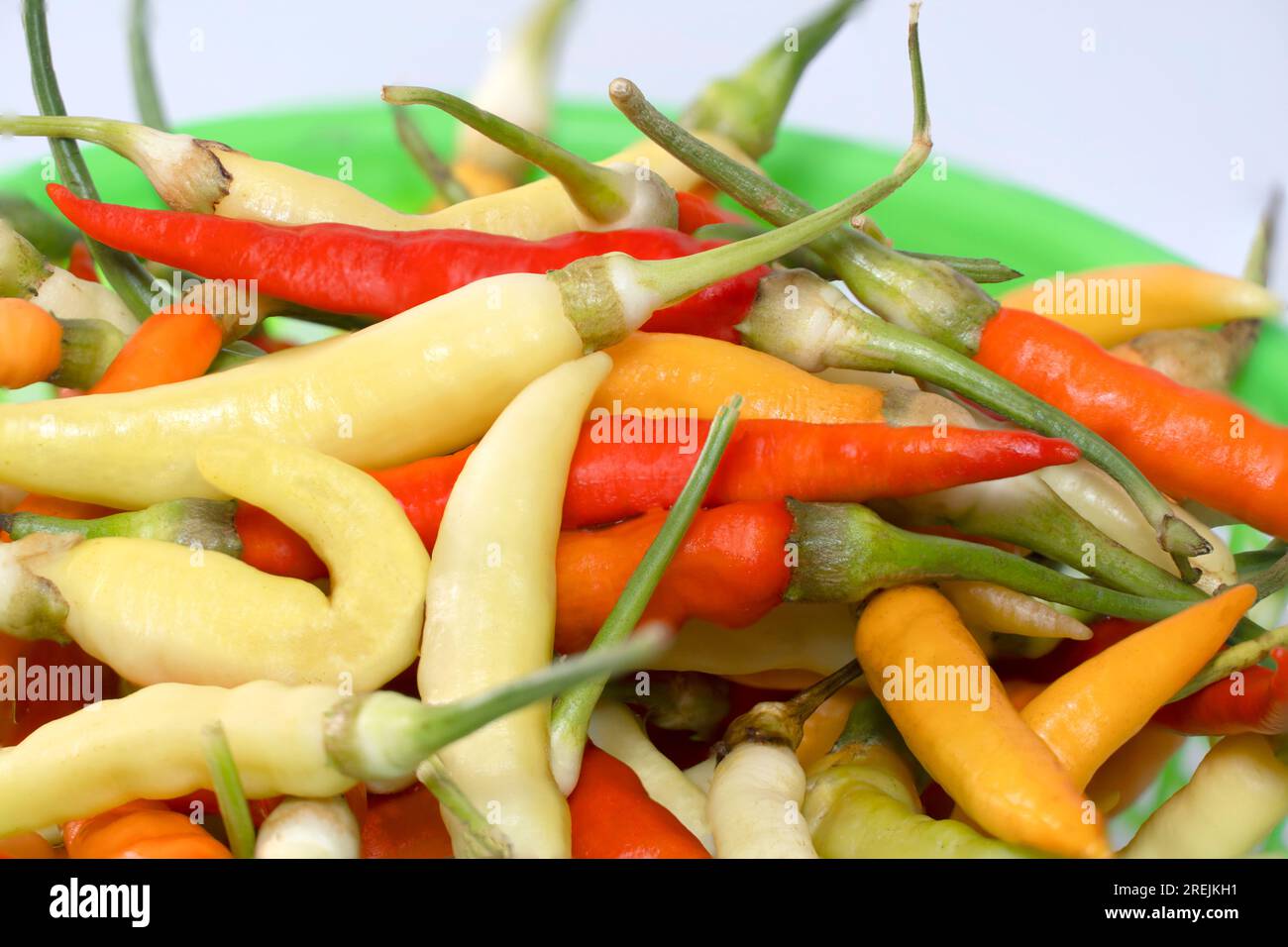 Red yellow chilli peppers isolated on white background. Cooking ...