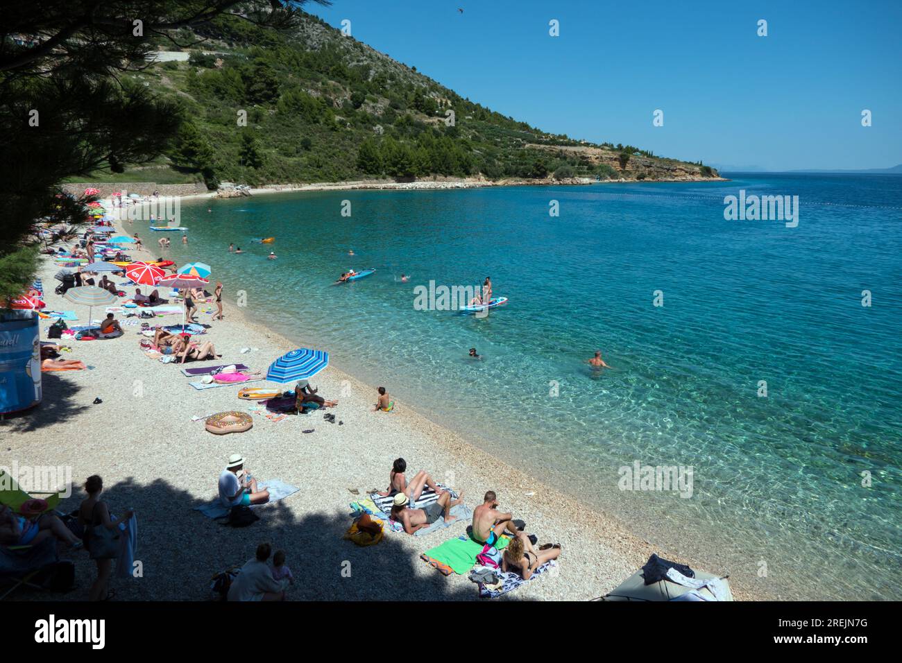 View of Martinica beach near Bol on Brac Island in Croatia, with people ...