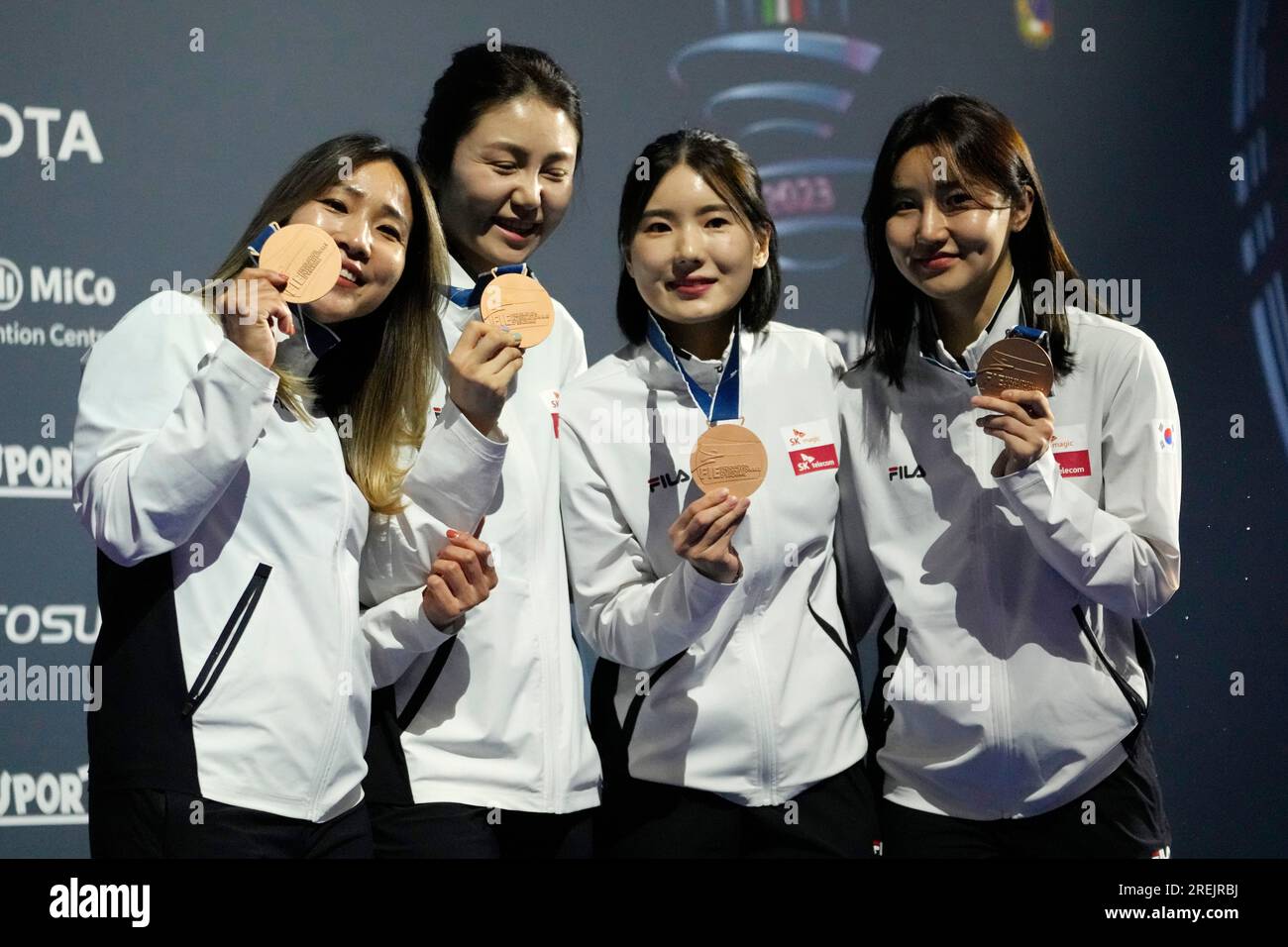 Korea team celebrates on the podium their bronze medals after the women ...