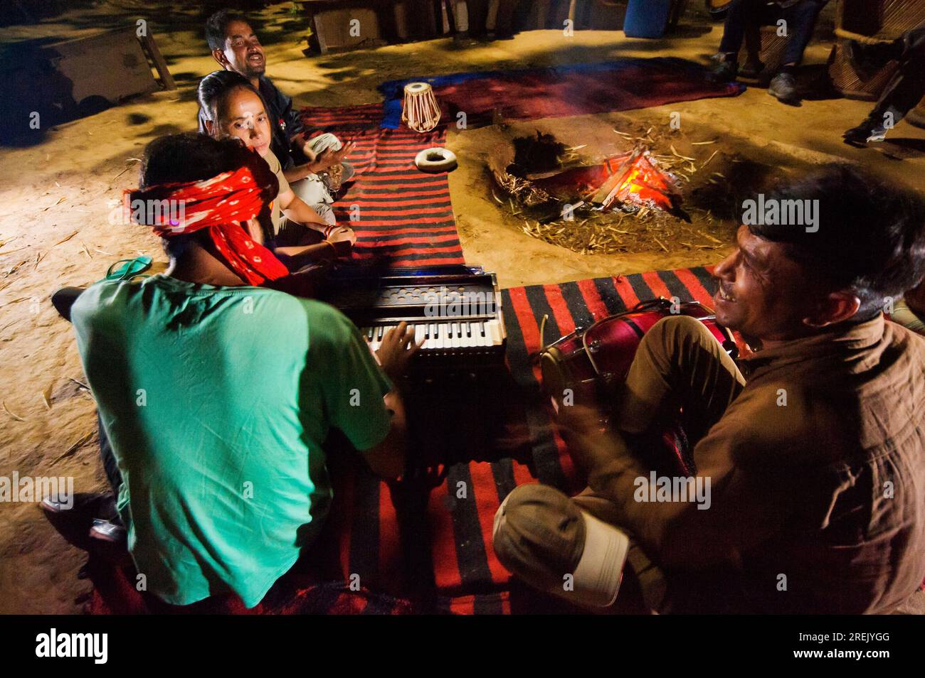 Indian people performing traditional songs at Kotabagh Kyari Syat Camp ...