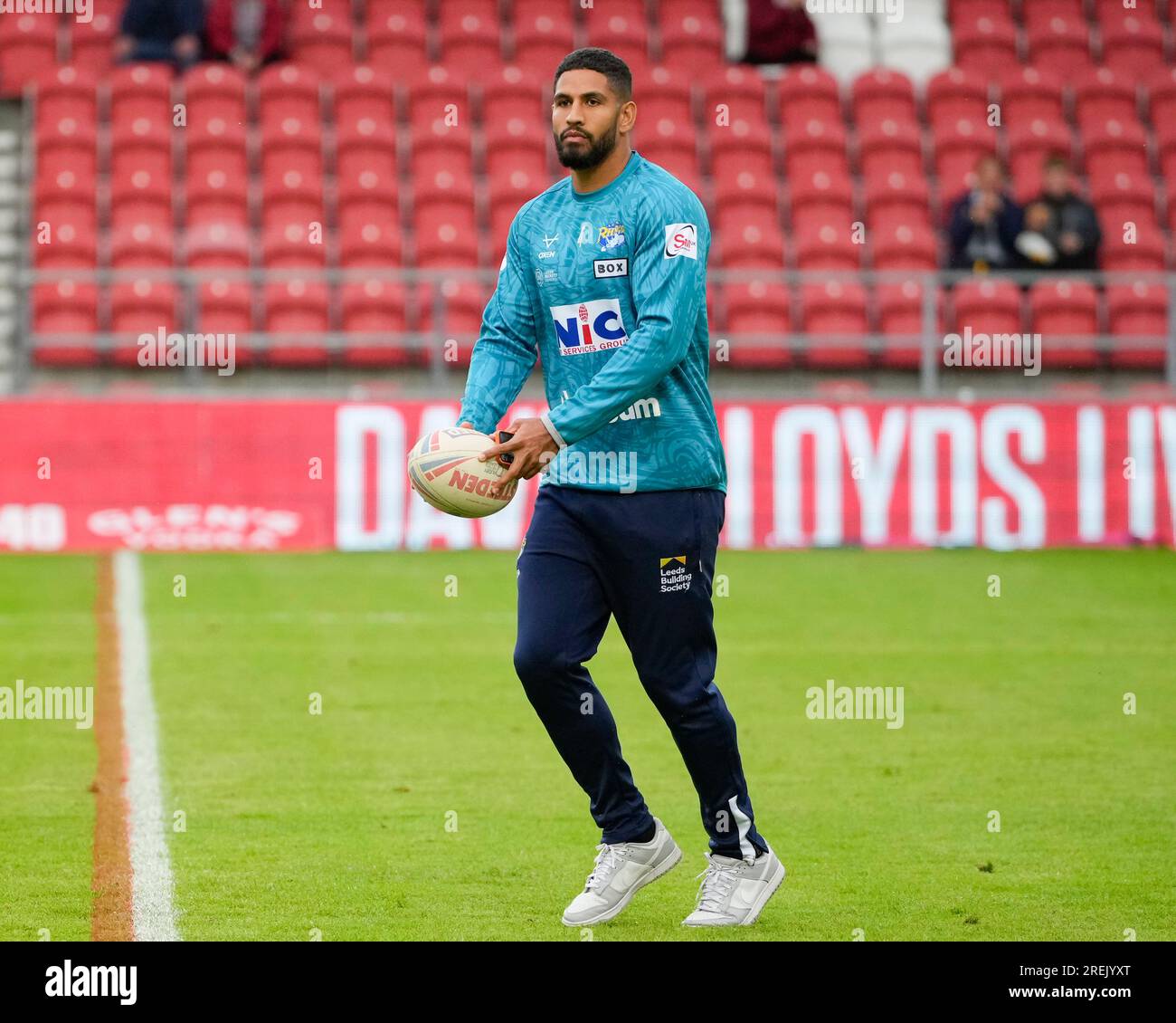 Nene Macdonald #4 of Leeds Rhinos inspects the pitch before the Betfred ...