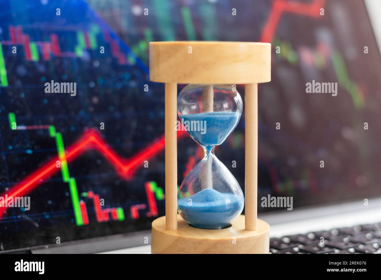 Dollar currency sign made of sand inside an hourglass. Concept of ...