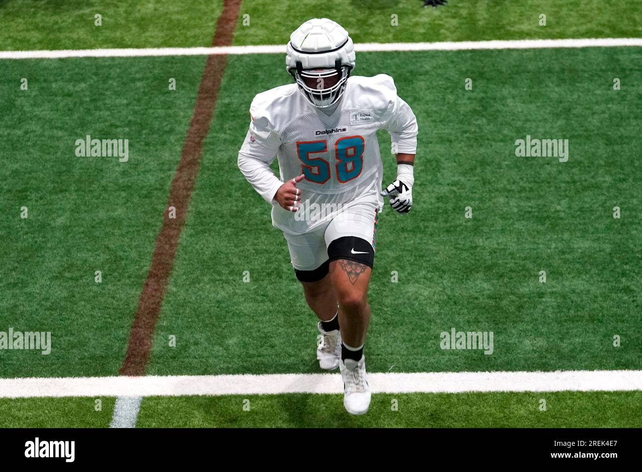 Miami Dolphins guard Connor Williams (58) runs drills during practice ...