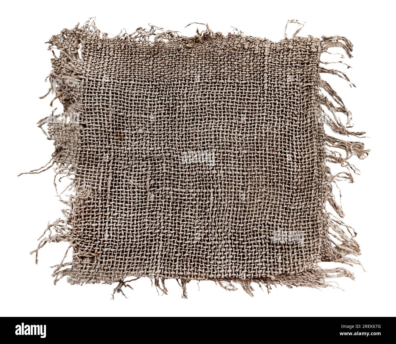 Burlap texture. A piece of torn burlap on a white background. Canvas ...
