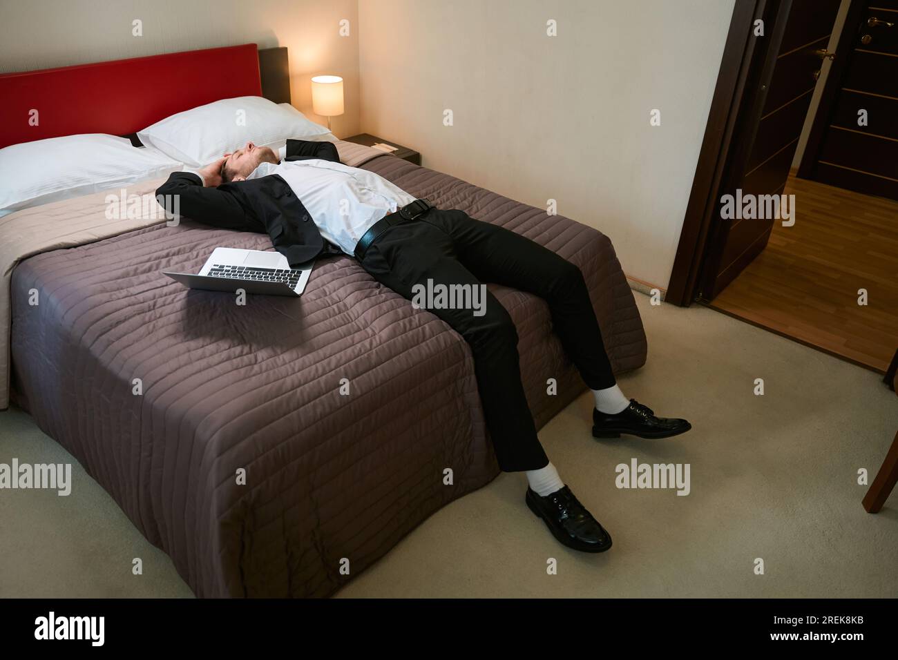 Man resting in bed after hi-res stock photography and images - Alamy