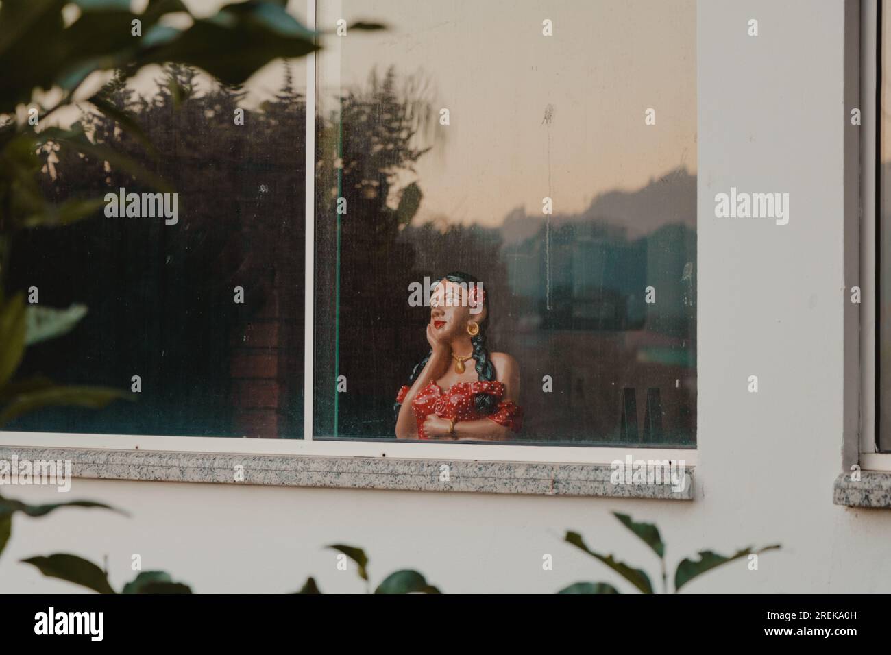 girl looking at the window Stock Photo - Alamy