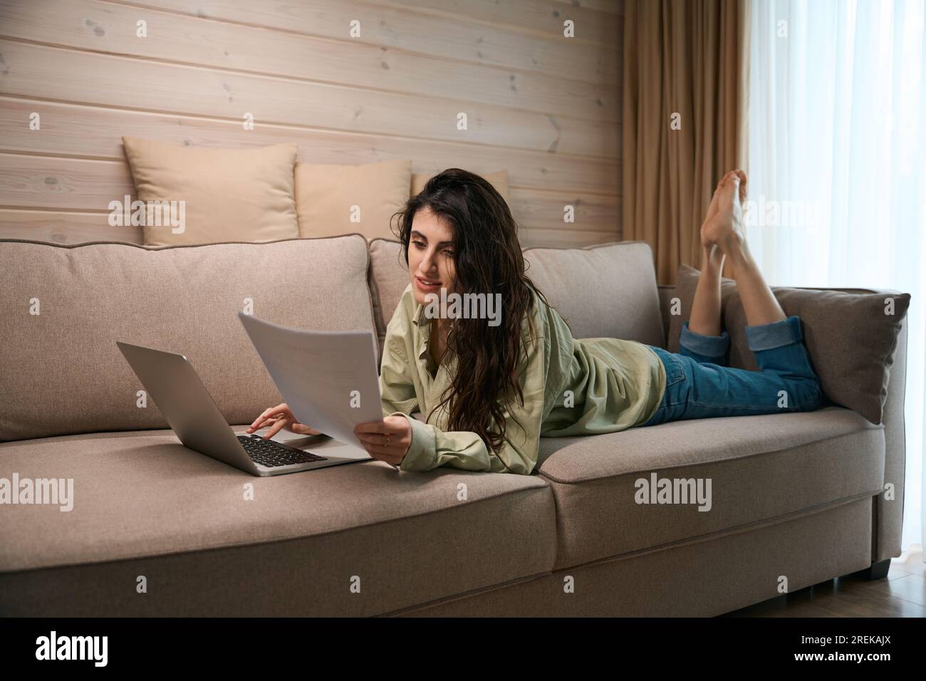 Concentrated beautiful woman doing paperwork or studying Stock Photo ...