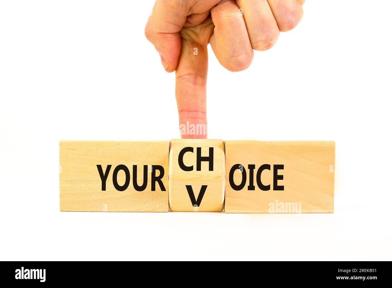 Your voice choice symbol. Businessman turns wooden cubes and changes ...
