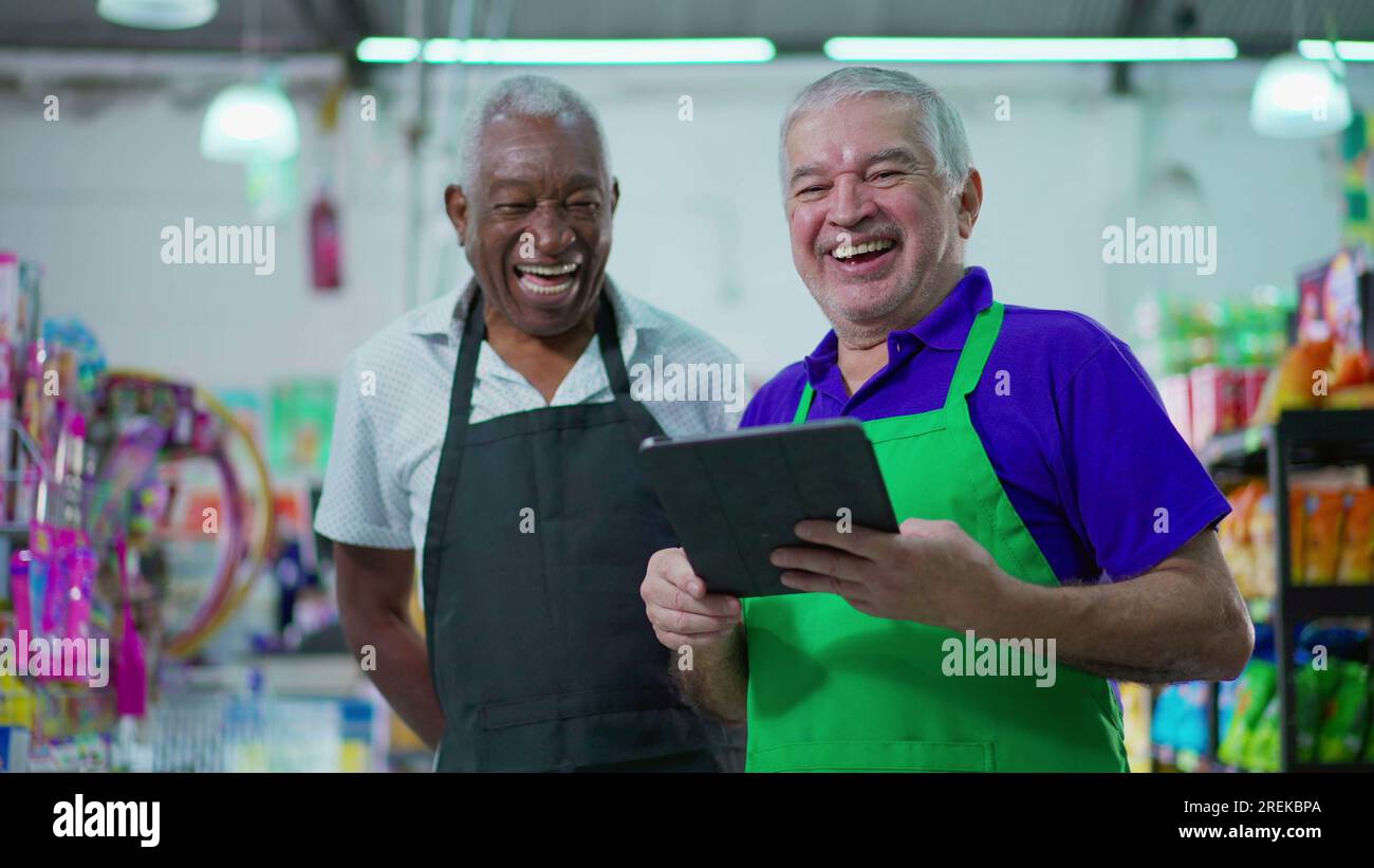 Supermarket chain smiling hi-res stock photography and images - Alamy