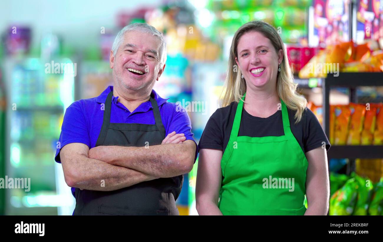 Joyful Supermarket Employees, Senior Male Manager and Middle-aged ...