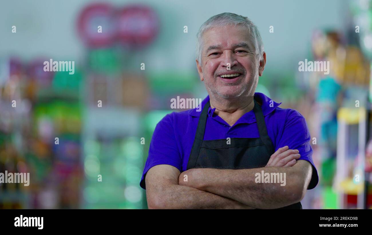 Happy older worker staff laughing hi-res stock photography and images ...