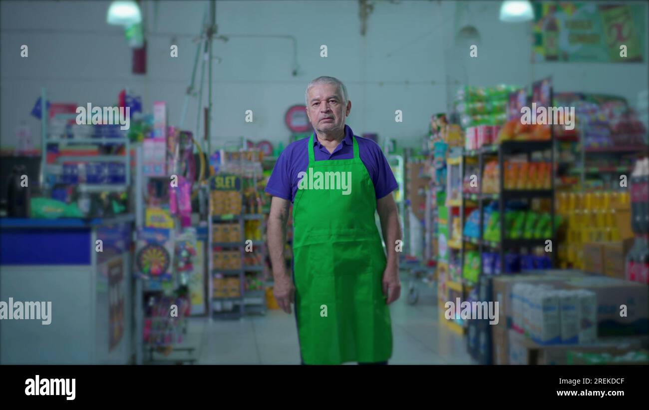 Elderly employee supermarket hi-res stock photography and images - Alamy