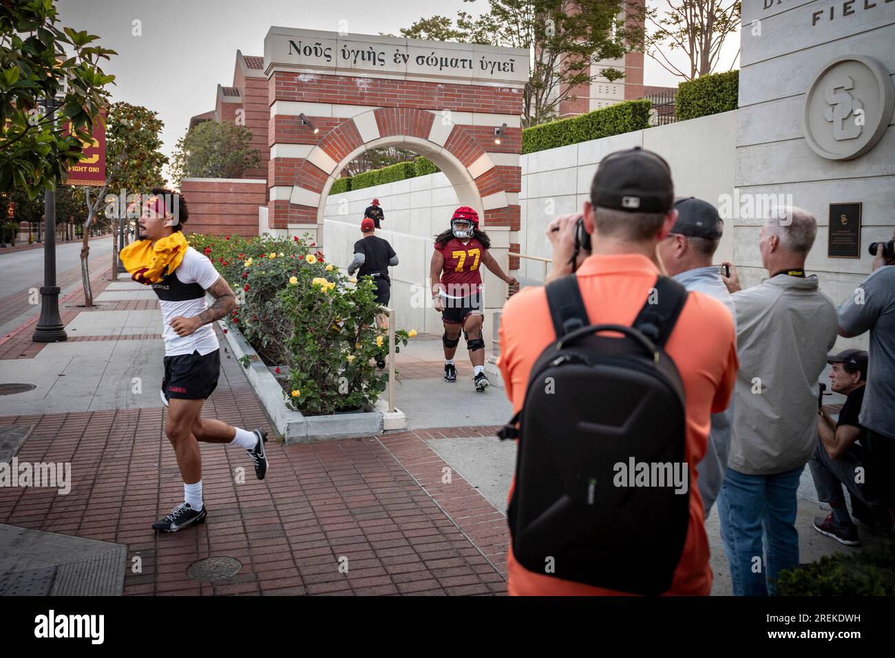 Southern California NCAA college football players head to the field for ...