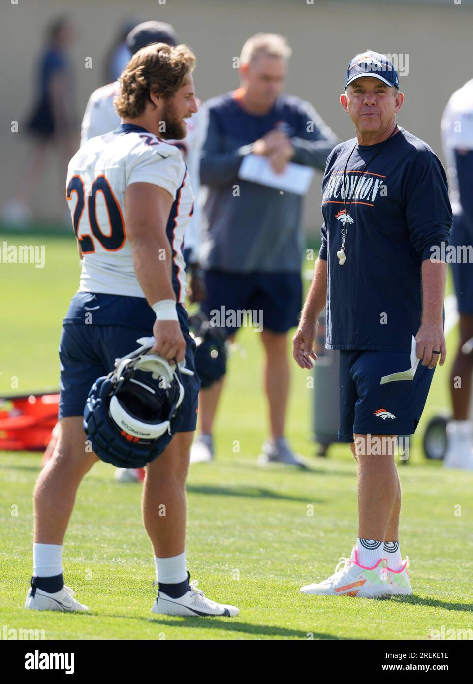 Denver Broncos head coach Sean Payton, right, chats with fullback ...