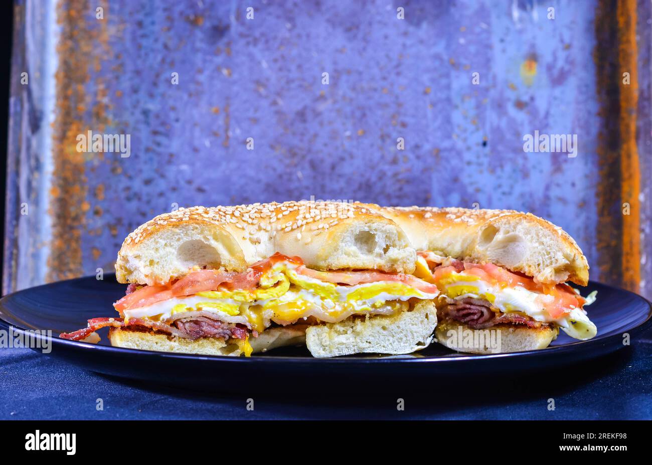 Bagel breakfast sandwich fast food cut in half copy space food ...