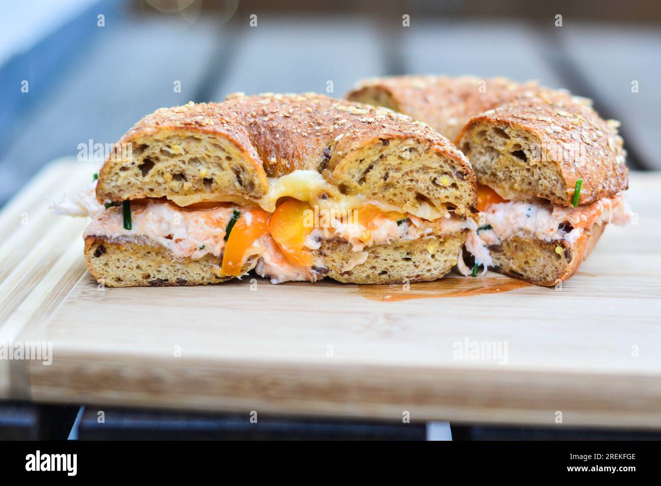 Bagel breakfast sandwich fast food cut in half copy space food ...