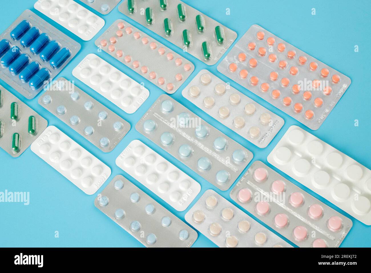 Colorful of tablets and capsules pill in blister packaging arranged ...