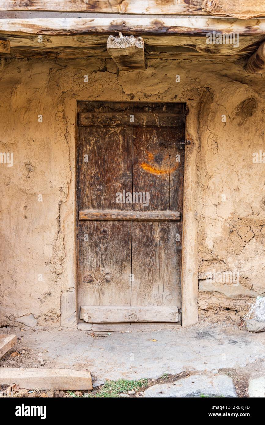 Sumbal Bala, Kangan, Jammu and Kashmir, India. A weathered wooden door ...