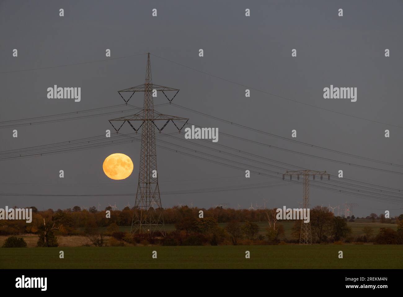 Moon with lattice mast Overhead line Stock Photo - Alamy
