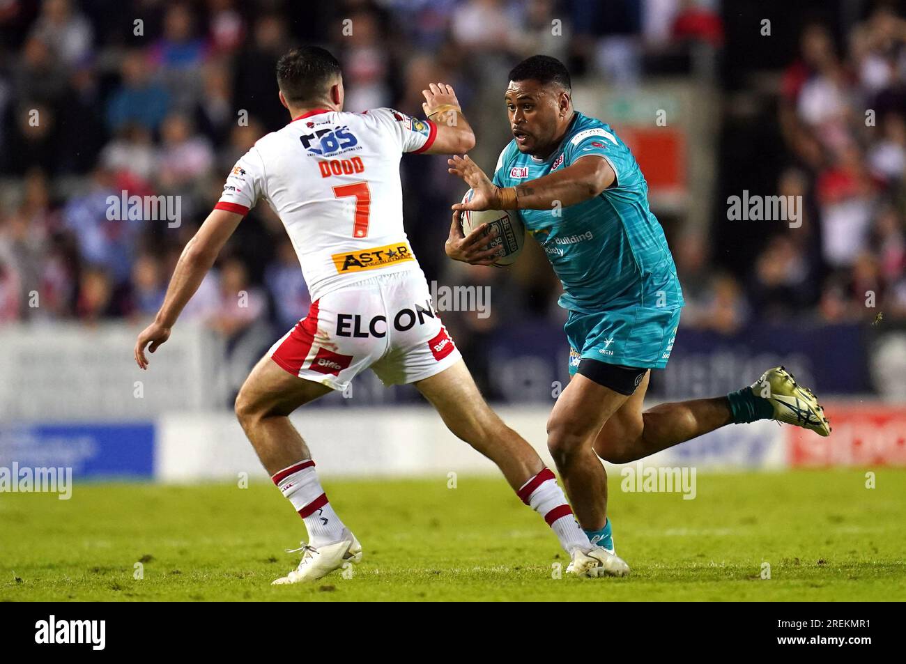 Leeds Rhinos' Sam Lisone (right) attempts to get past St Helens' Lewis ...