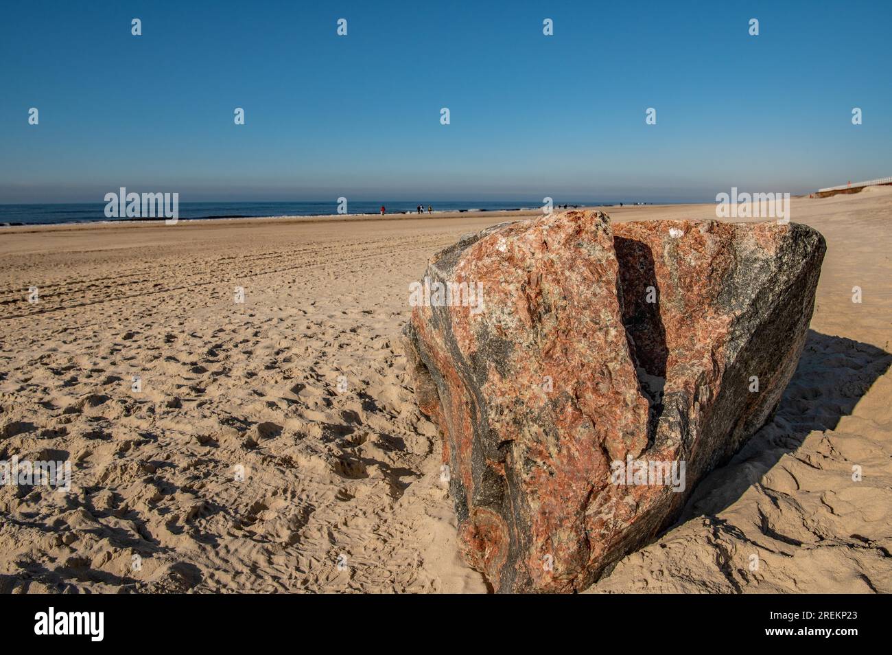 Boulder on the beach Stock Photo - Alamy