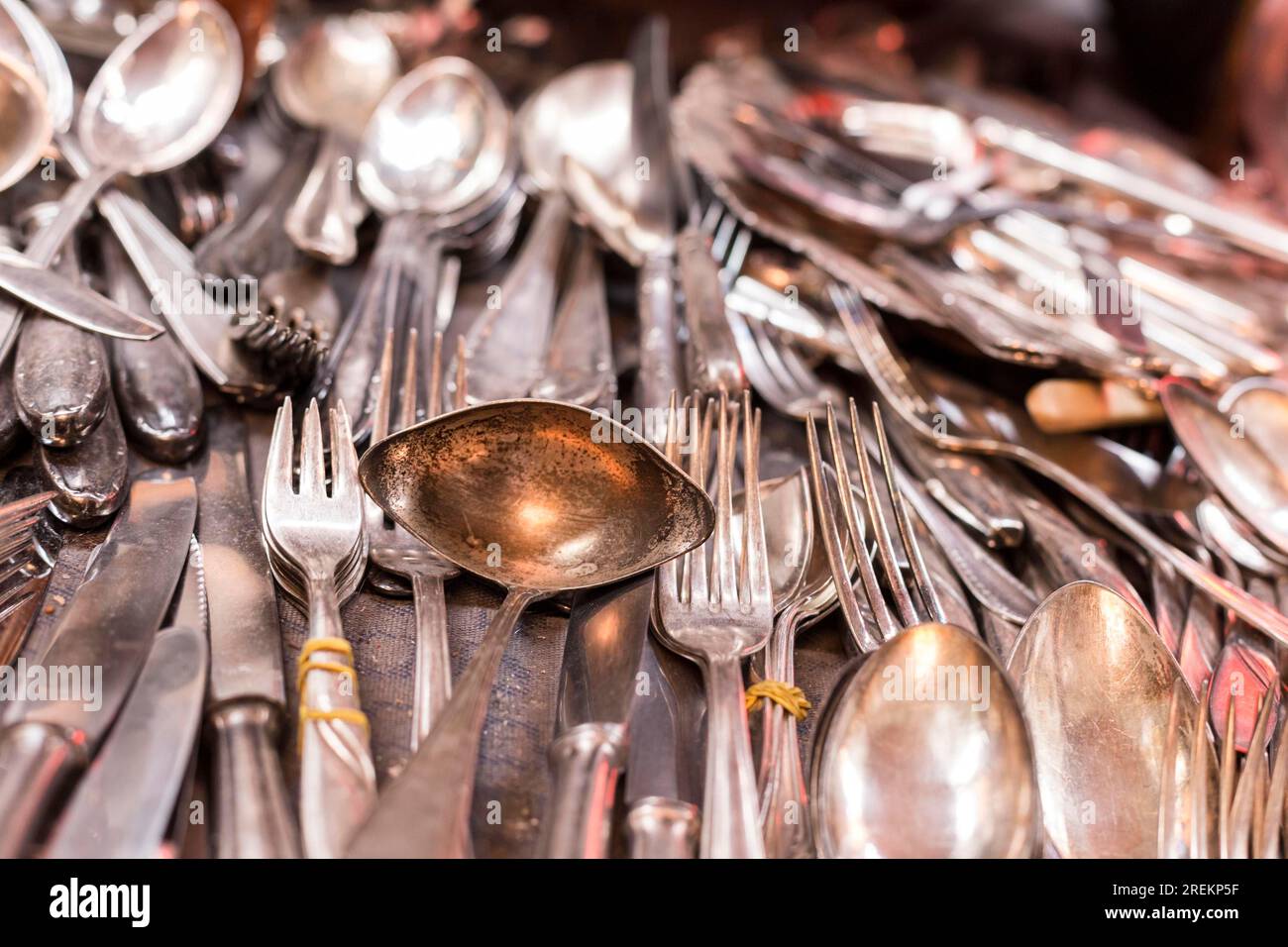 Bunch of old silver ware on a flea market Stock Photo - Alamy