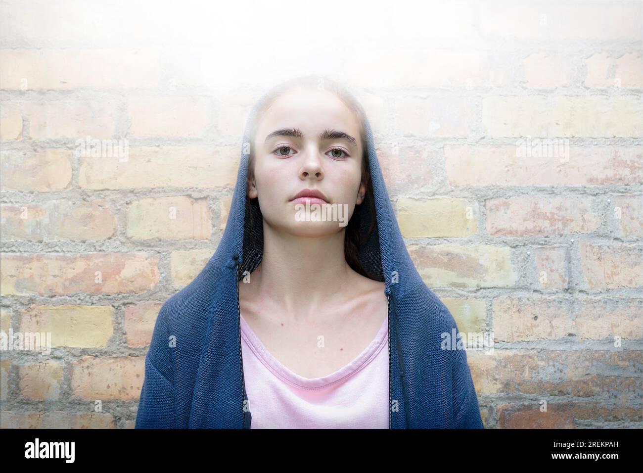 Maria Like Portrait Of A Teenager Girl In Front Of An Old Wall Stock