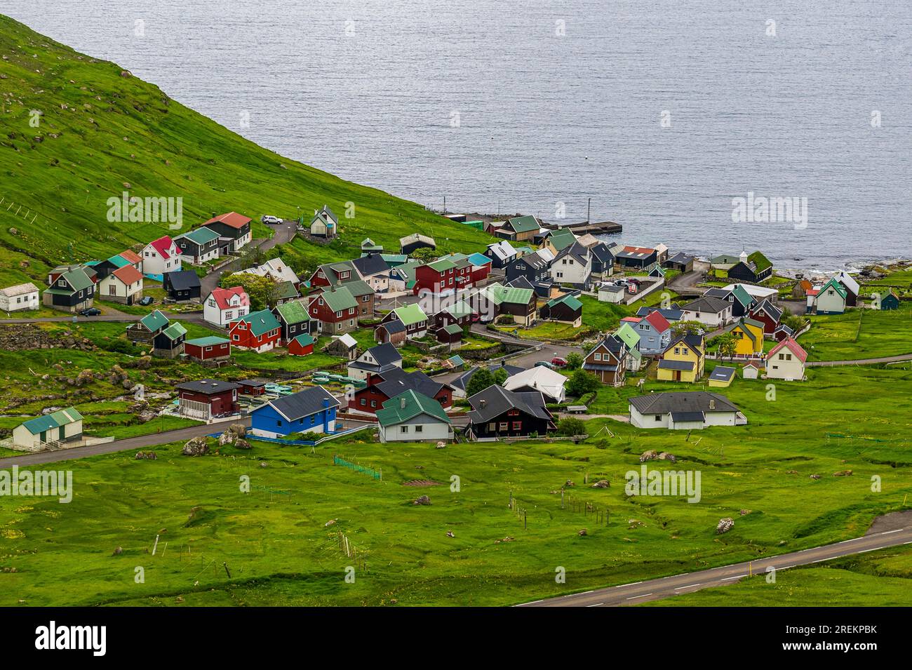 Little village Funnigur in a huge fjord, Estuyroy, Faroe islands ...