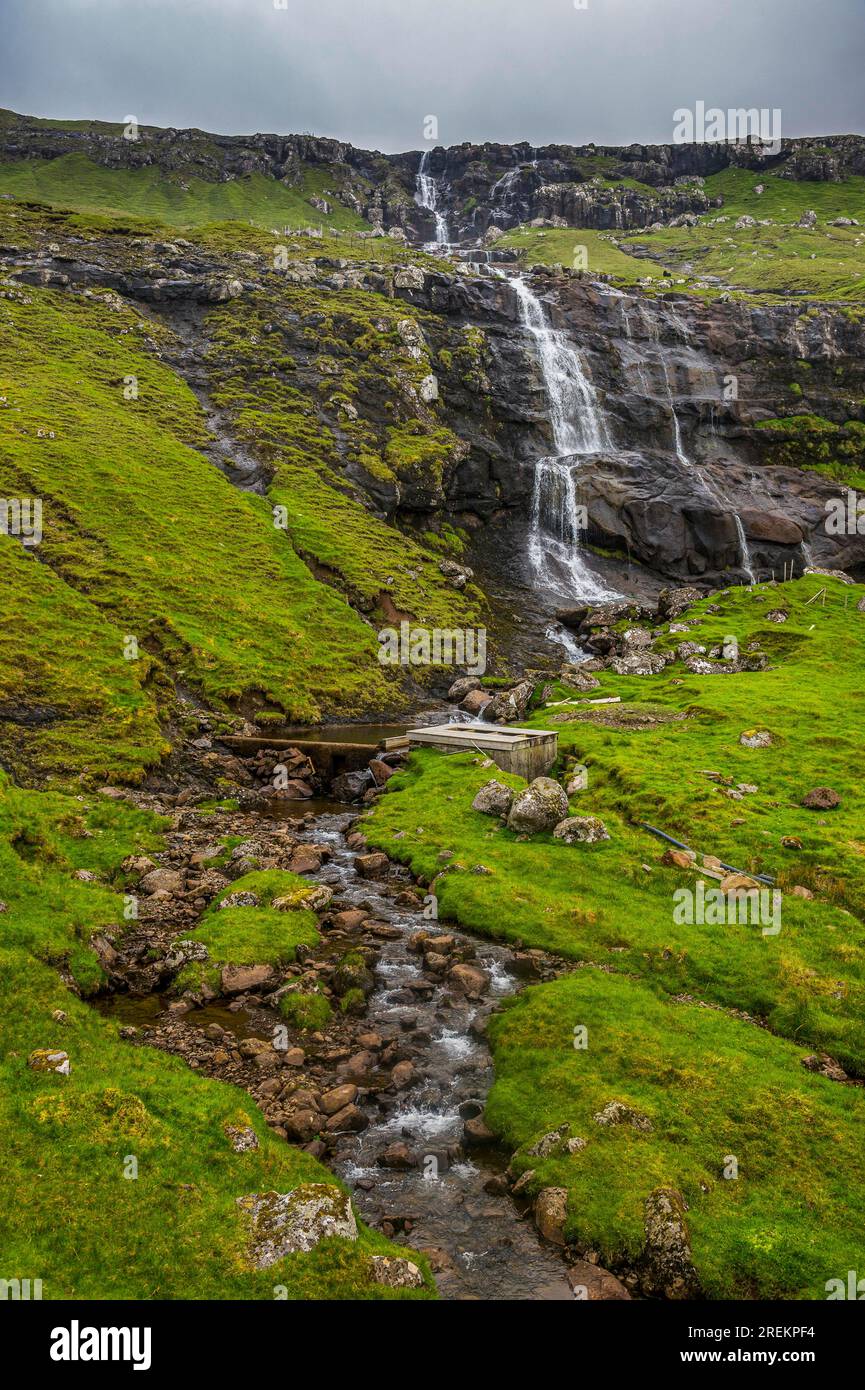 Landscape with waterfall in the faroe islands hi-res stock photography ...