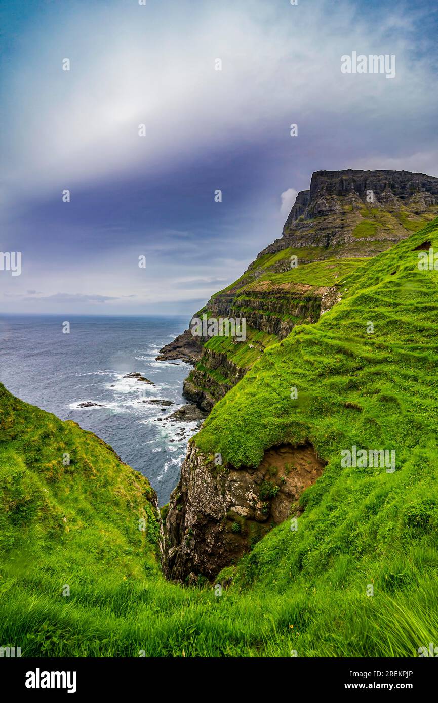 Huge cliffs in Gasadalur, Vagar, Faroe islands, Denmark Stock Photo - Alamy