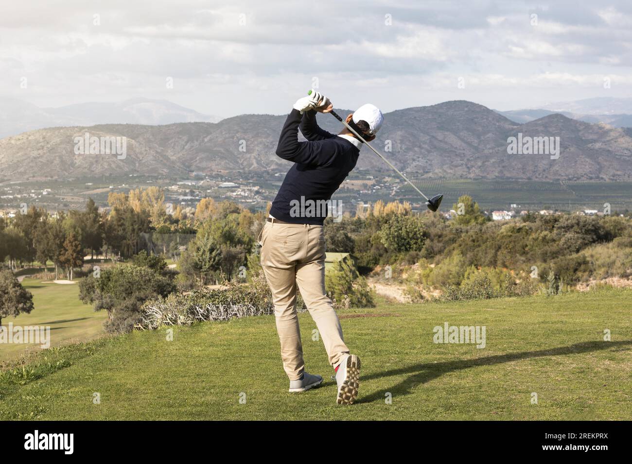 Back view man playing golf field. Resolution and high quality beautiful ...