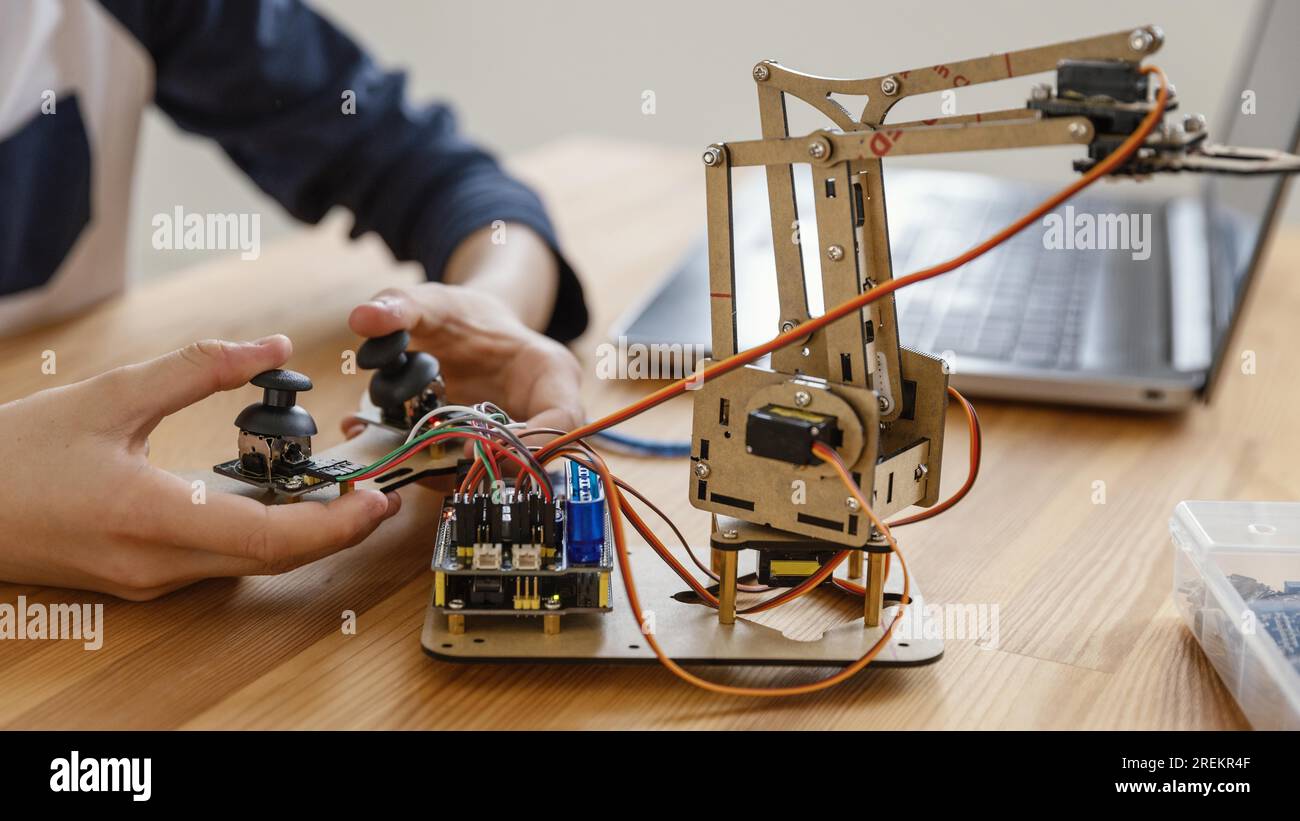 Child making robot close up. Resolution and high quality beautiful ...