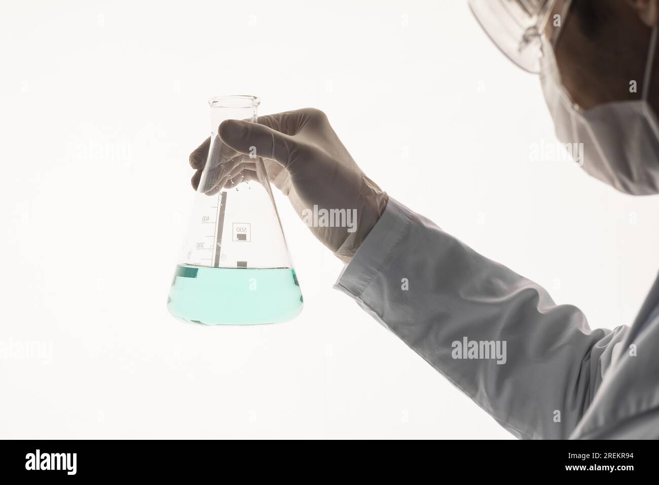 Close up hand holding erlenmeyer flask 2. Resolution and high quality ...