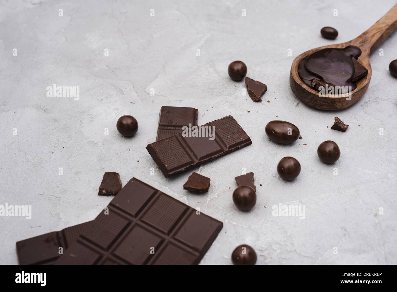 Dark chocolate bar with candies. Resolution and high quality beautiful ...