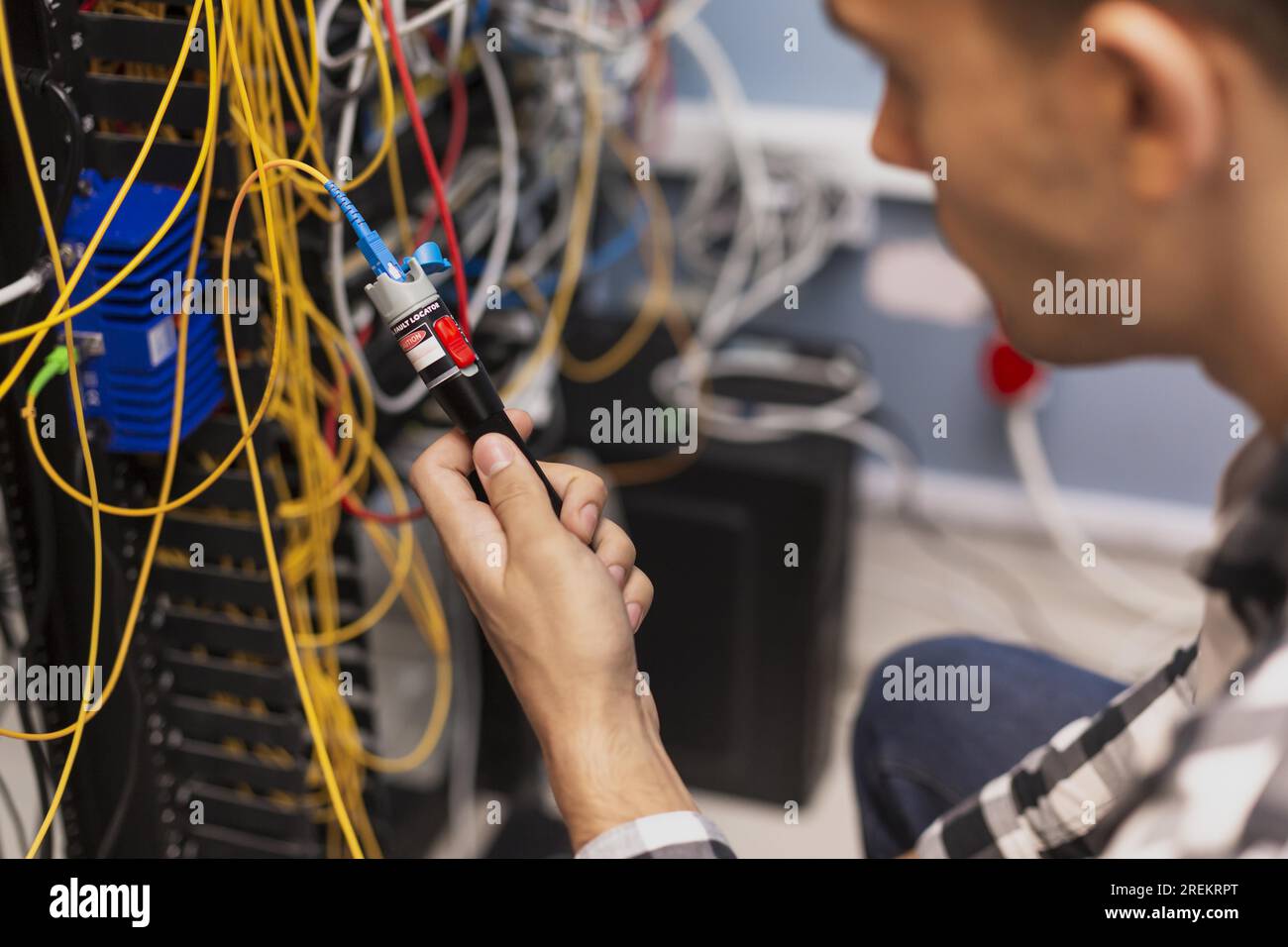 Engineer man testing optical fiber. Resolution and high quality ...
