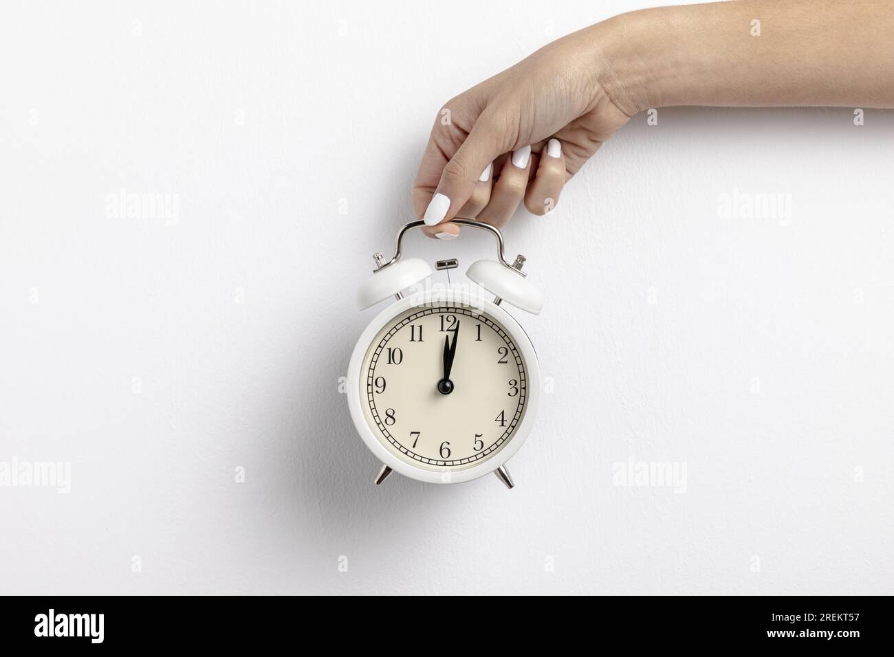 Front view hand held clock with copy space. Resolution and high quality ...