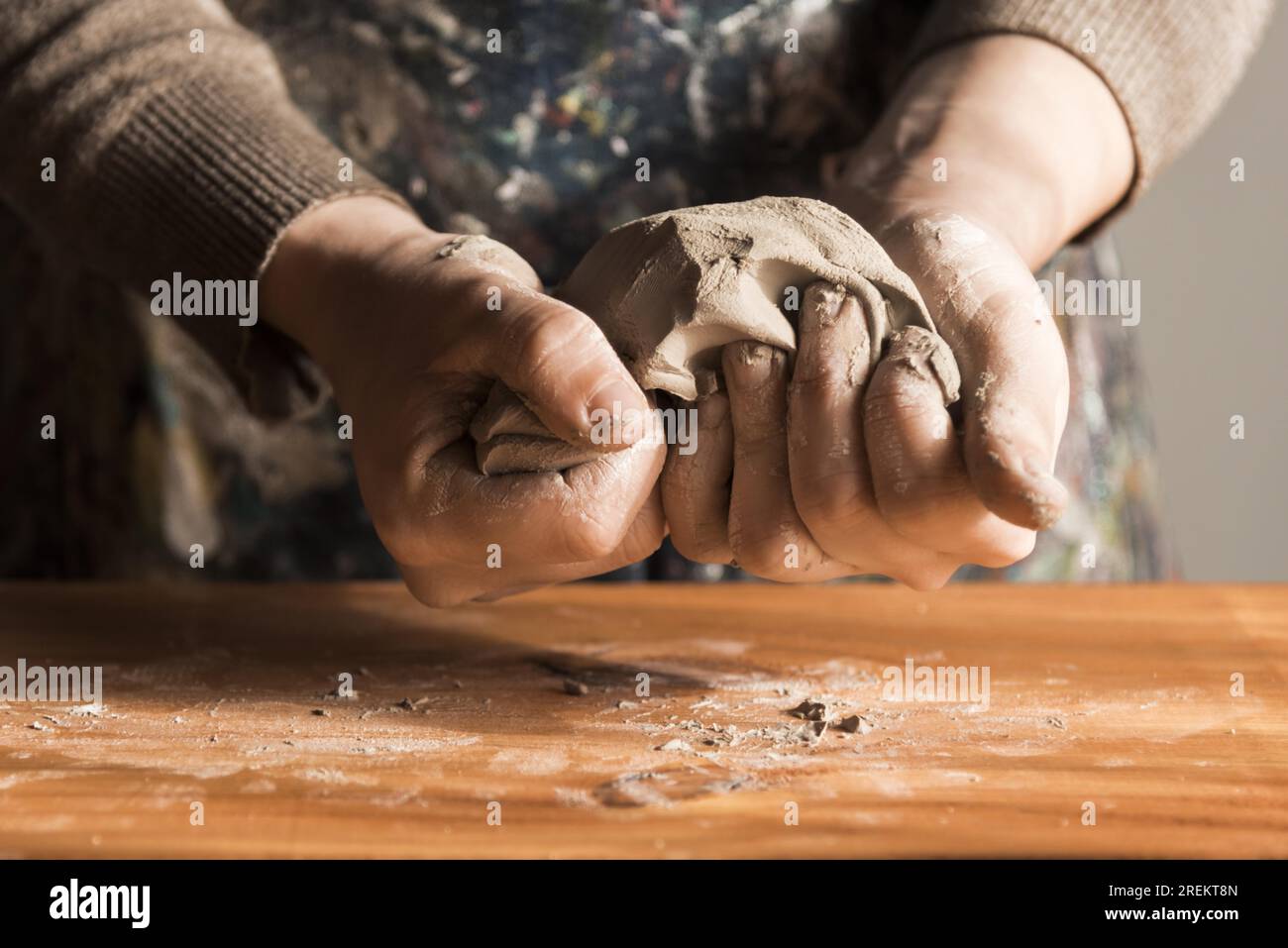 Front view woman shaping clay. Resolution and high quality beautiful ...
