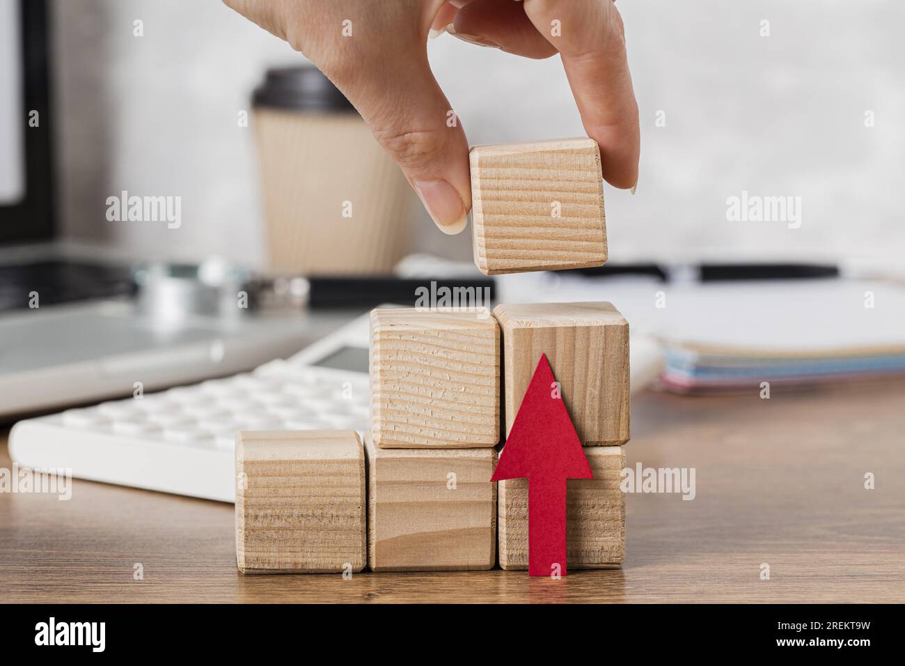 Hand placing wooden block represent growth 2. Resolution and high ...