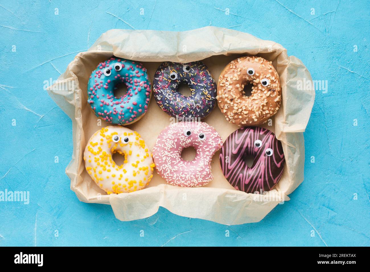Glazed donuts with eyes top view. Resolution and high quality beautiful ...