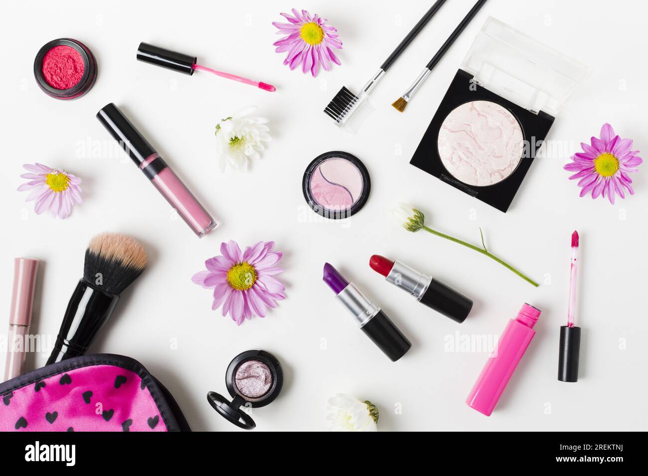 Collage feminine colourful cosmetics white desk. Resolution and high ...