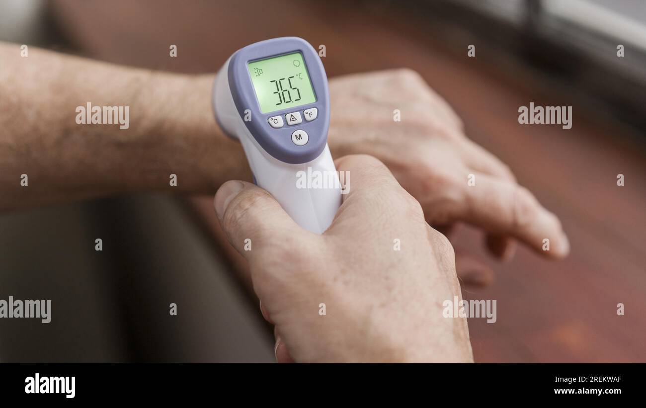 Patient having his temperature checked. Resolution and high quality ...