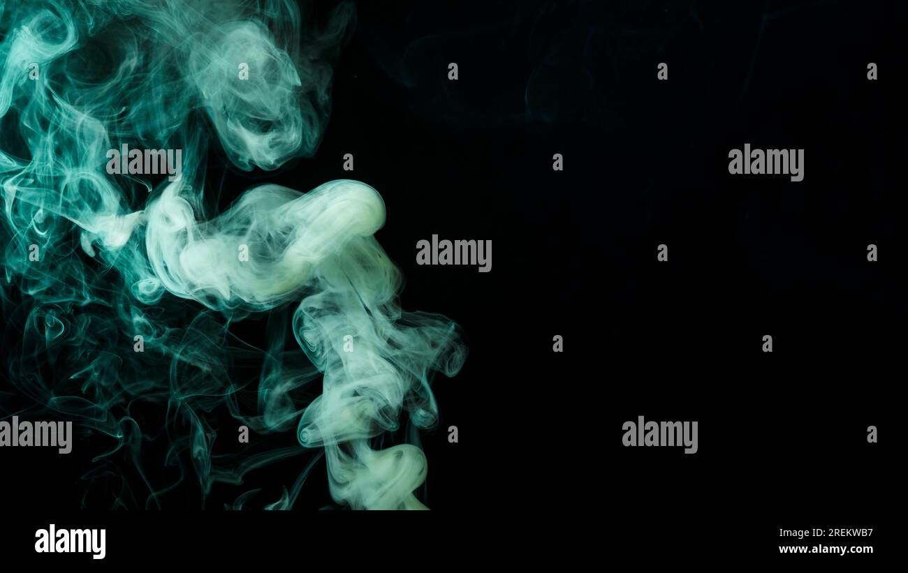 Abstract green smoke move black background. Beautiful photo Stock Photo ...