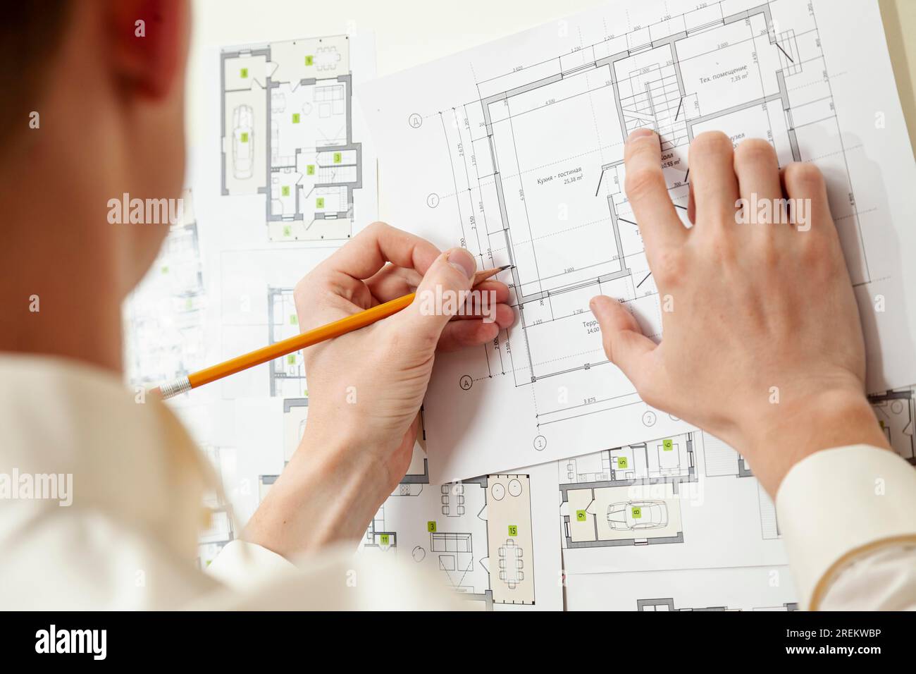 Architect working house project. Beautiful photo Stock Photo - Alamy