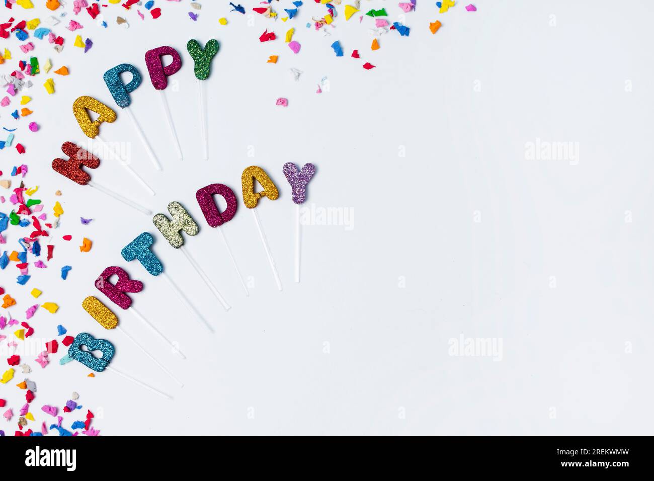 Flat lay happy birthday lettering white background with copy space ...